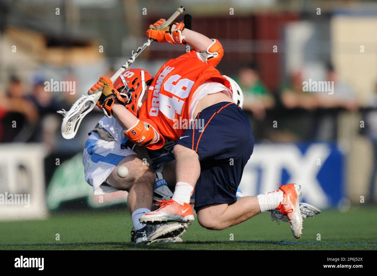 March 17, 2012 : Syracuse's Grant Fitts (46) and Hopkins Stefan ...