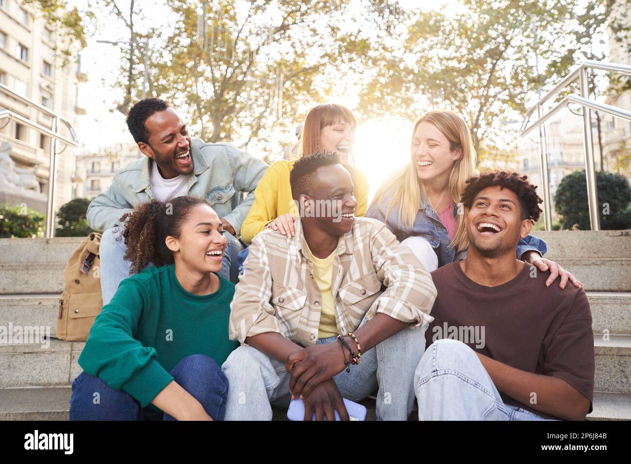 Friendly gatherings in the city. Urban portrait of carefree happy group ...