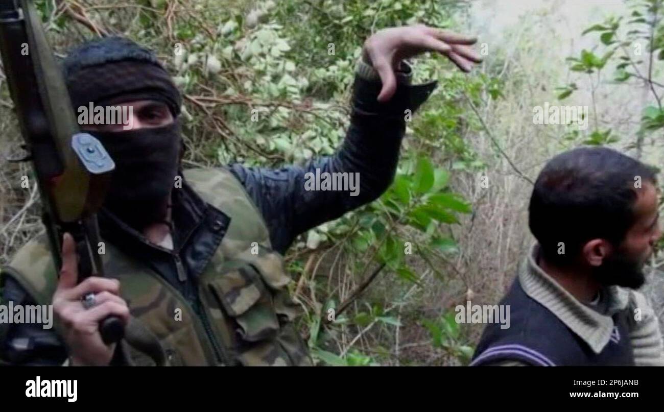 This video image taken from AP Television shows two Free Syrian Army ...