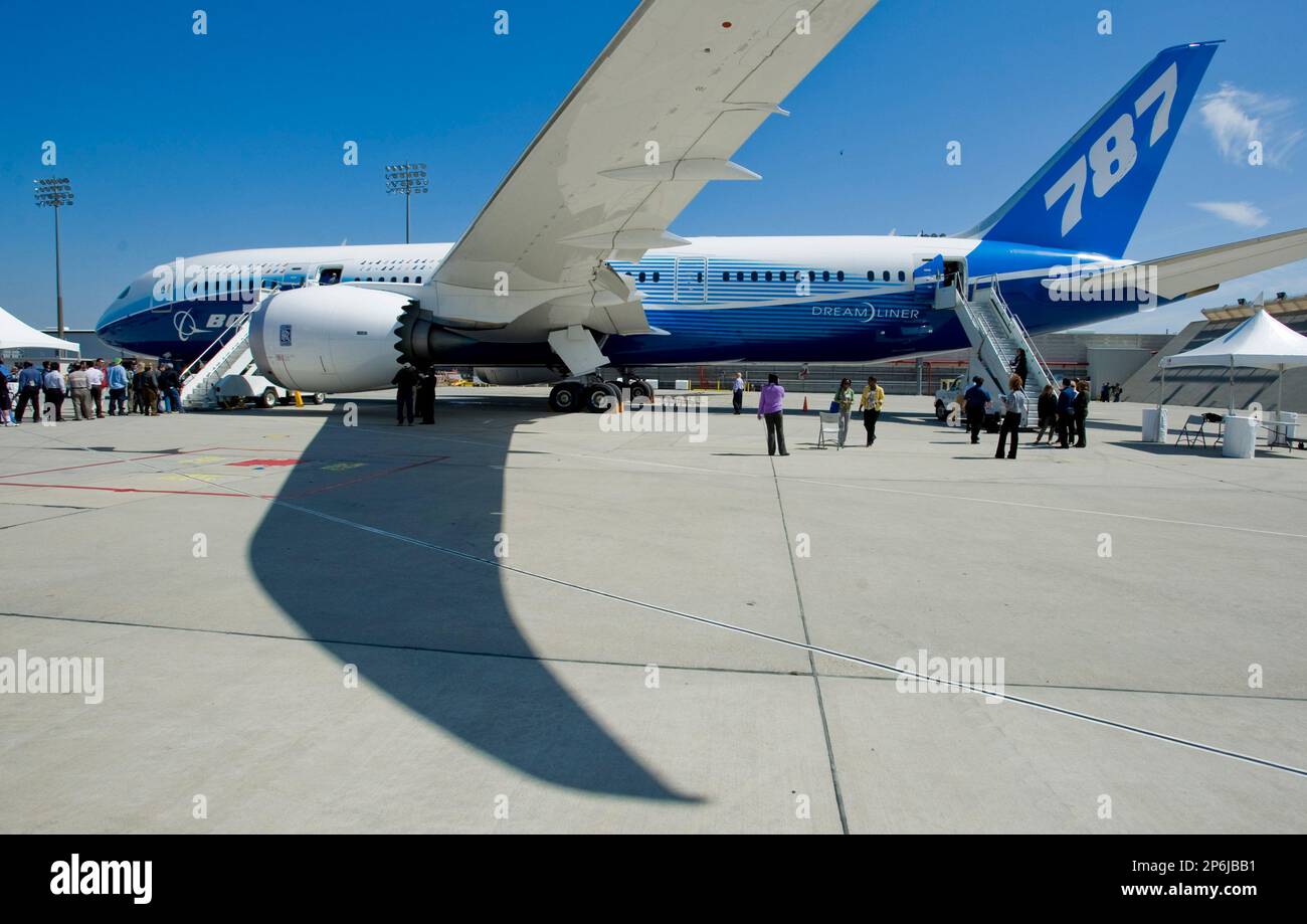 Visitors tour a flight test version of the Boeing 787 Dreamliner as it ...