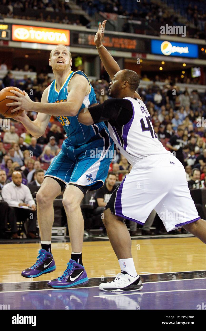New Orleans Hornets center Chris Kaman (35) looks for the basket as ...