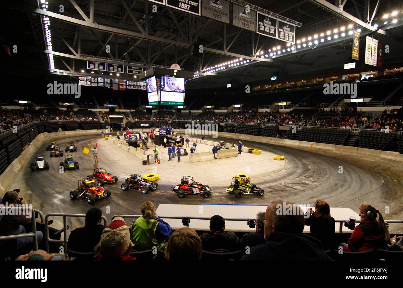 Three Quarter (TQ) Midget racing cars compete during the 2012 Coffee ...