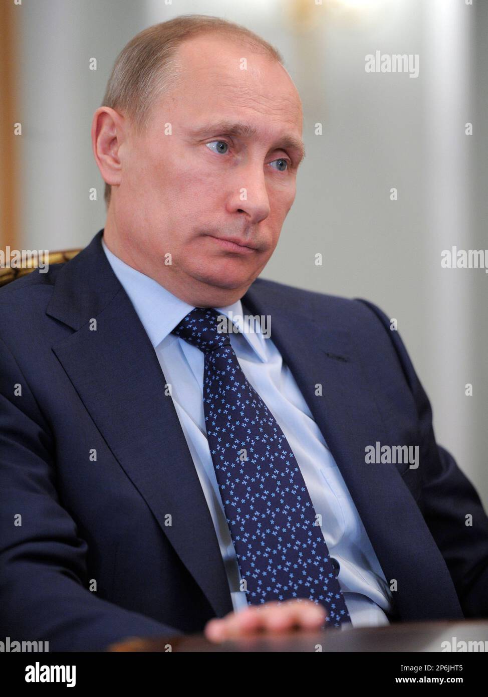 Russian Prime Minister Vladimir Putin looks on during his meeting with ...