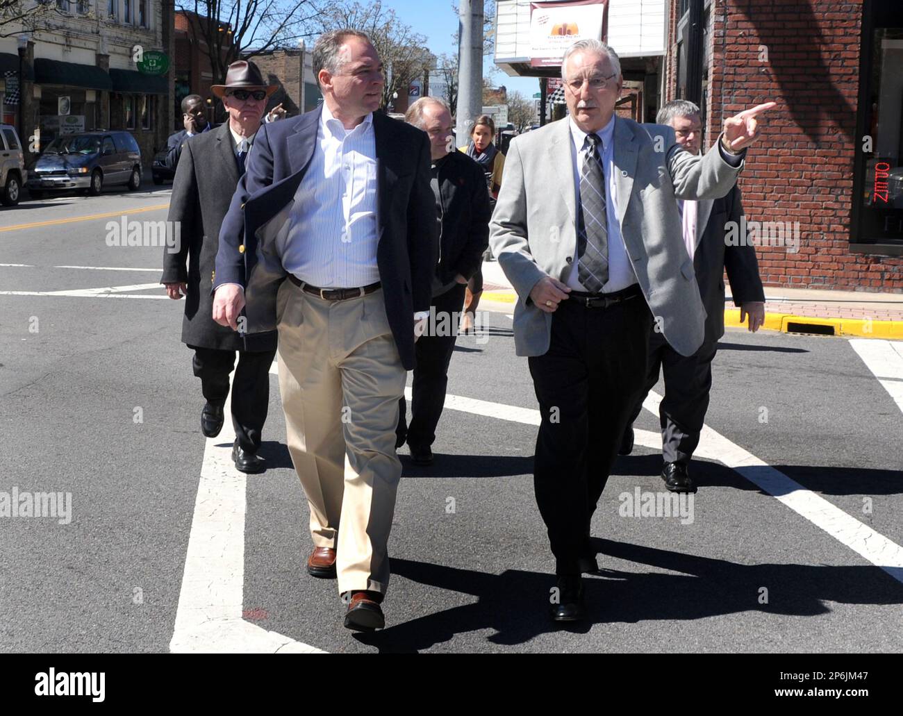 Bristol, Va. Mayor Ed Harlow, right, leads former Virginia governor and ...