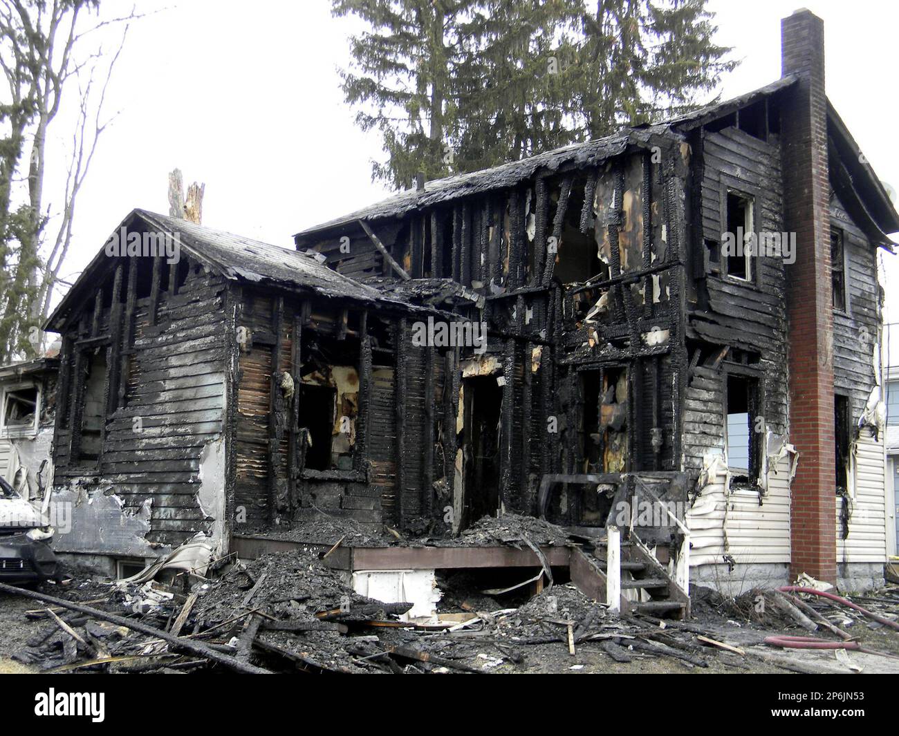 A house sits destroyed after it was consumed by fire early Friday ...