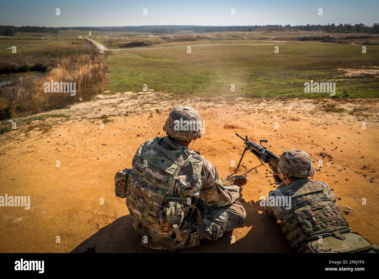 Paratroopers assigned to the 82nd Combat Aviation Brigade shoot the ...