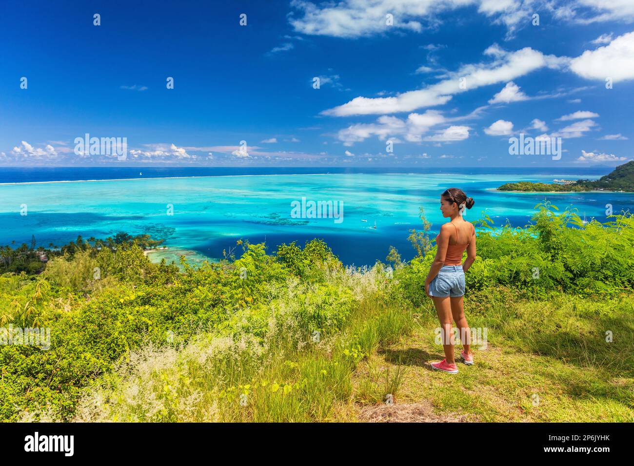 Bora Bora Tahiti cruise travel shore excursion tourist woman hiking on ...