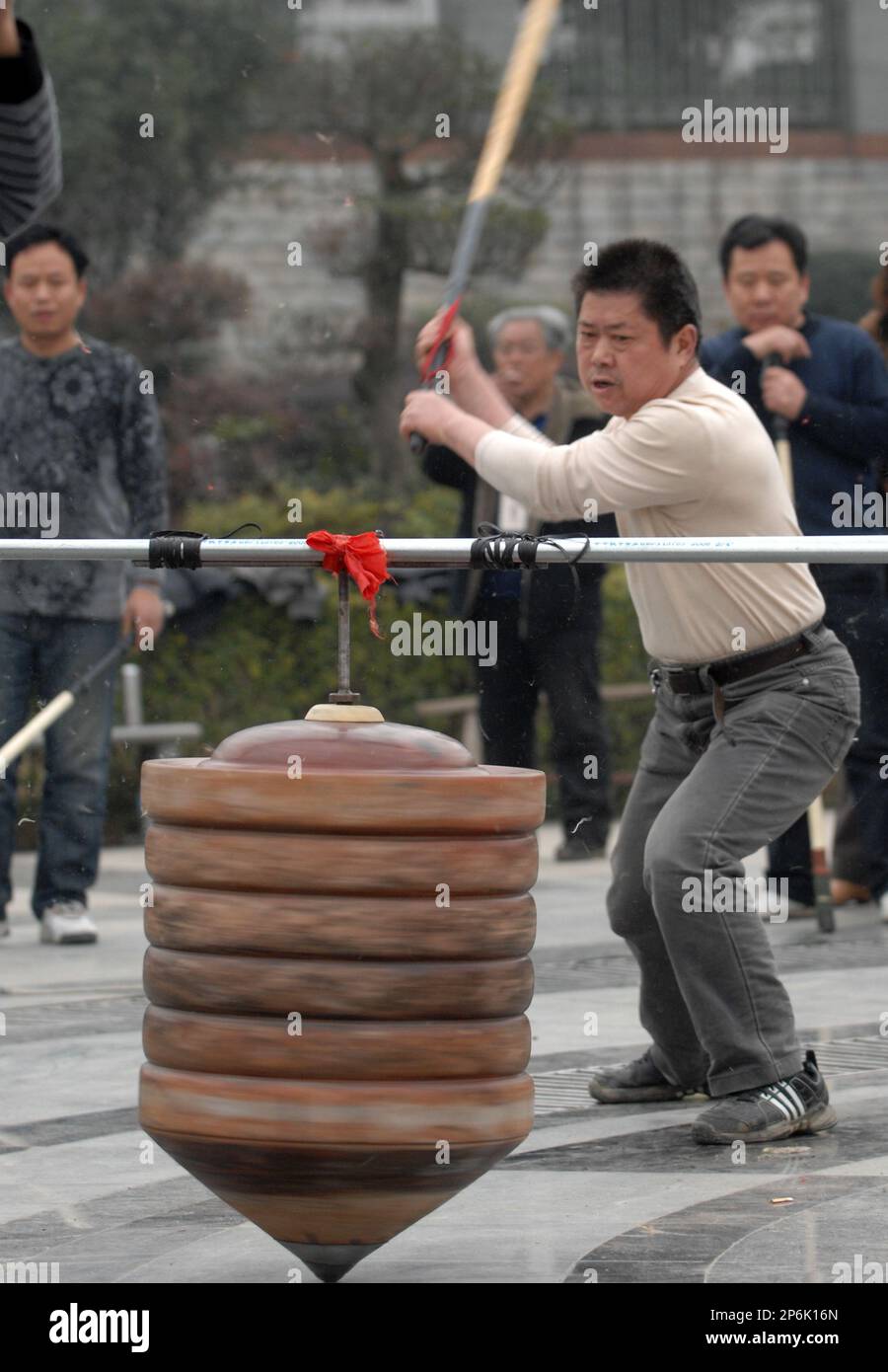 A 338-jin-weight huge spinning top is on running test in Wuhan, Hubei ...