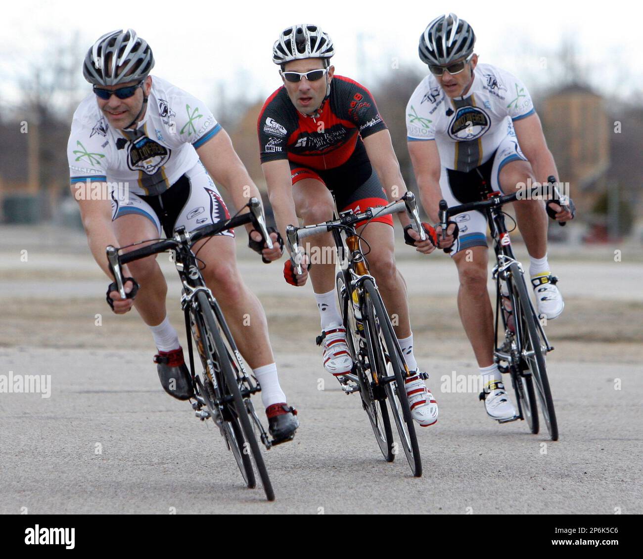 Richard Cassube, left, Jeff Peters, center, and Alex Fedak compete in ...