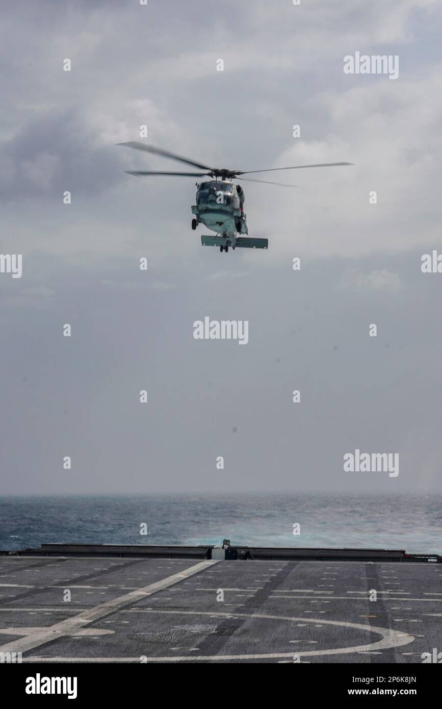 NATUNA SEA (Feb. 26, 2023) An MH-60R SeaHawk, attached to Helicopter ...
