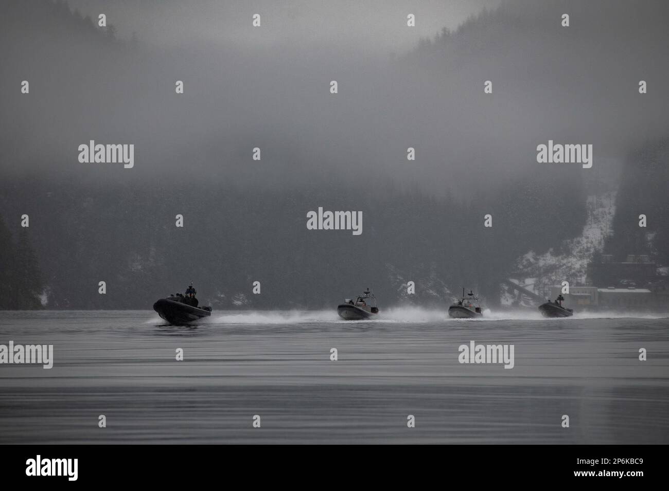 Two U.S. Coast Guard Maritime Safety Response Team West response boats ...