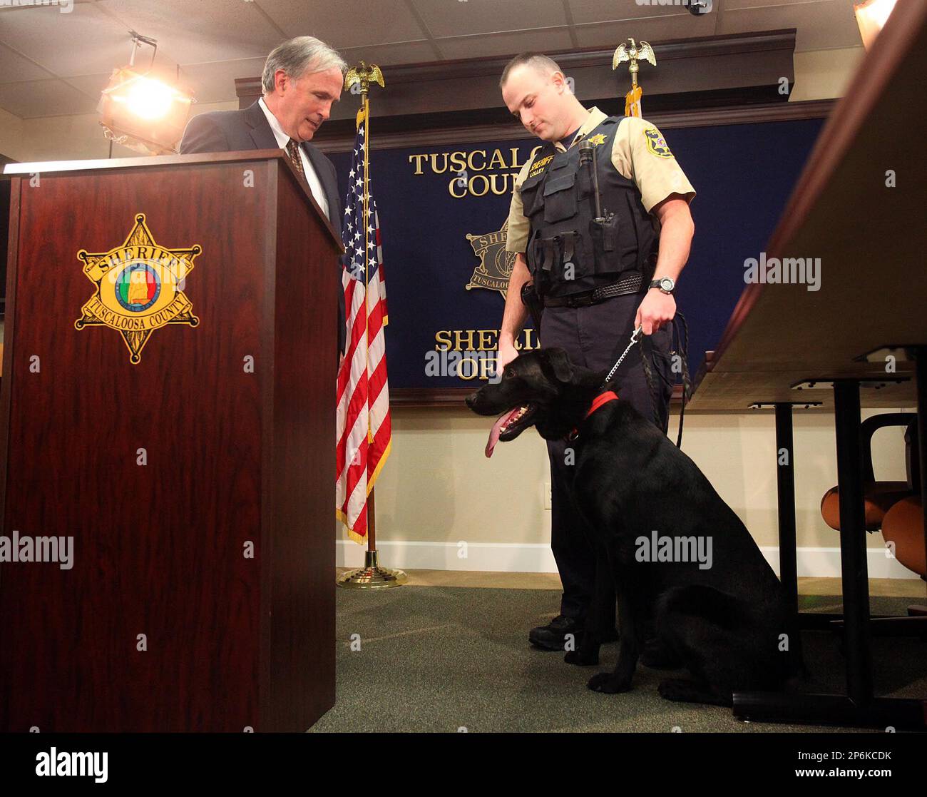 In a Wednesday, Feb. 29, 2012 photo, Sheriff Ted Sexton, left, swears ...
