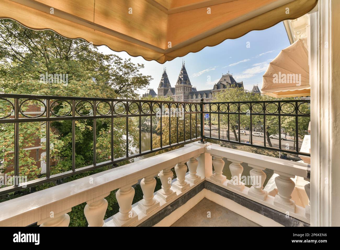 an outside area with trees and buildings in the background, taken from ...