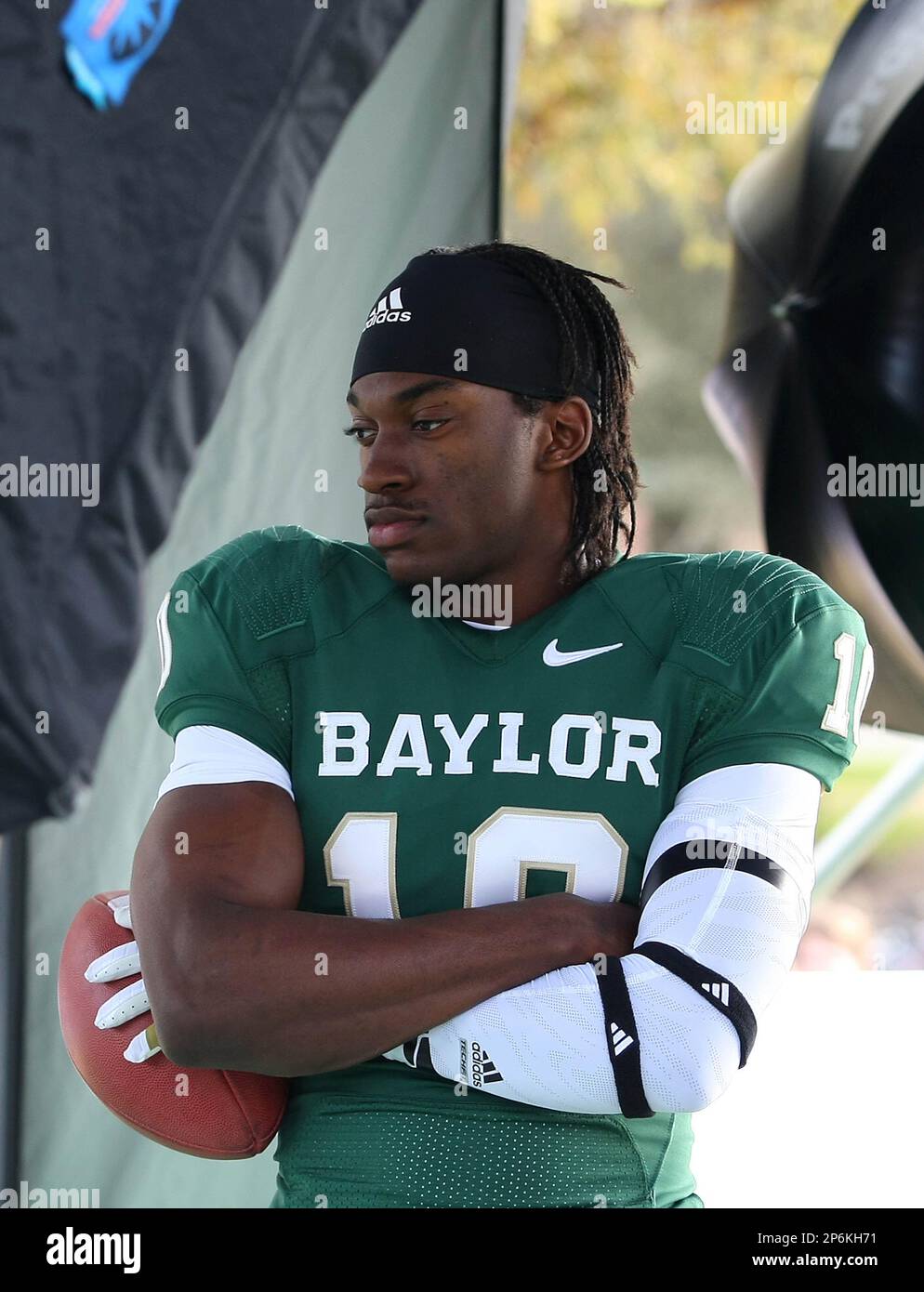 Heisman Trophy-winner and former Baylor quarterback Robert Griffin III poses for a photo on the ...