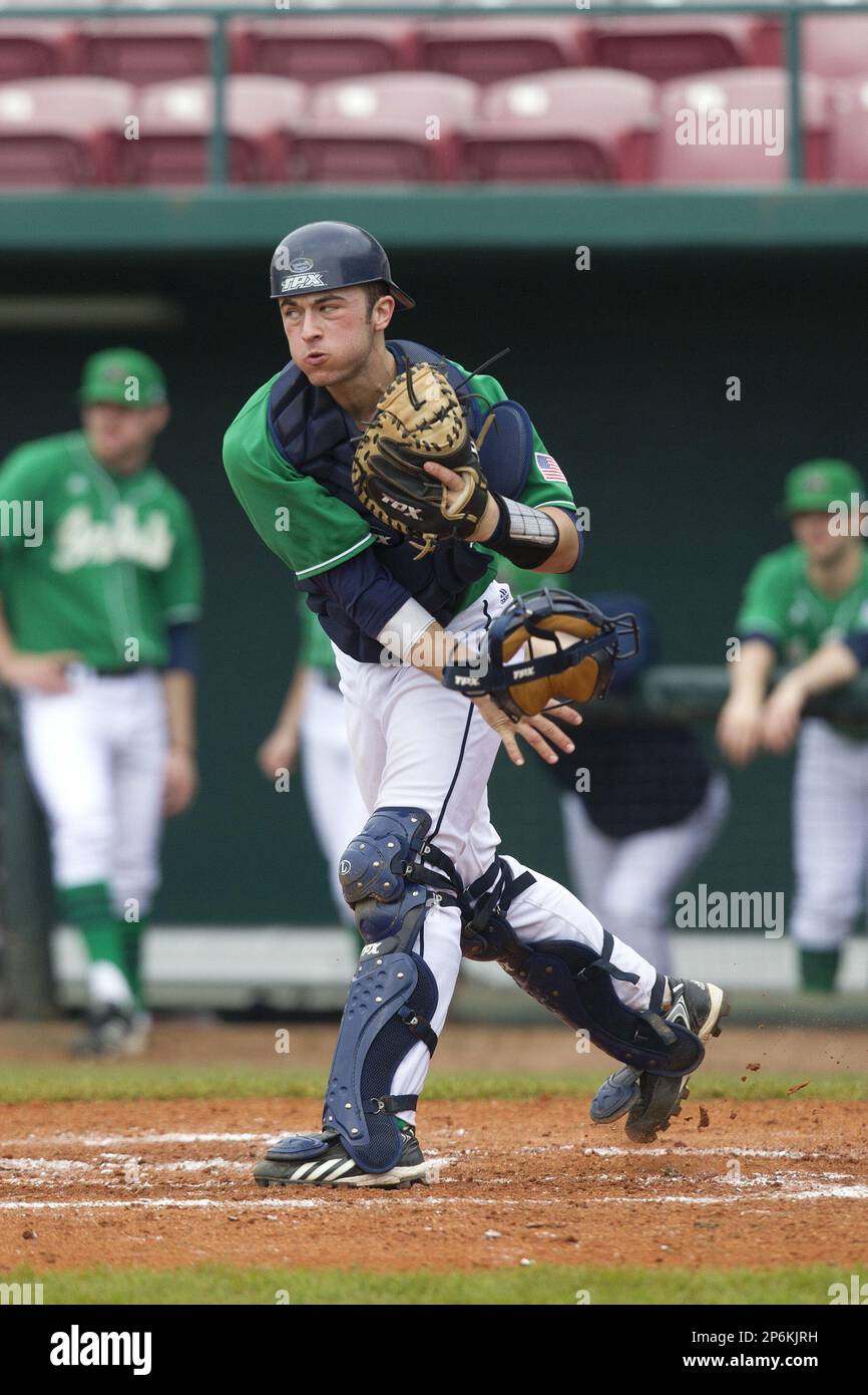 Notre Dame Fighting Irish catcher Joe Hudson #4 throws to second during ...
