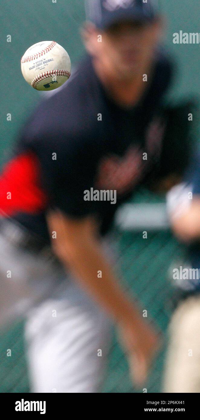 A ball thrown by Atlanta Braves pitcher Cory Gearrin makes its way to ...