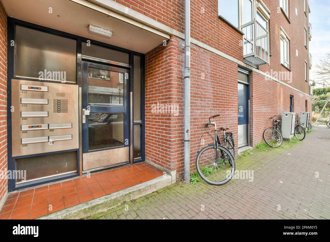 Amsterdam, Netherlands - 10 April, 2021: a bicycle parked in front of a ...