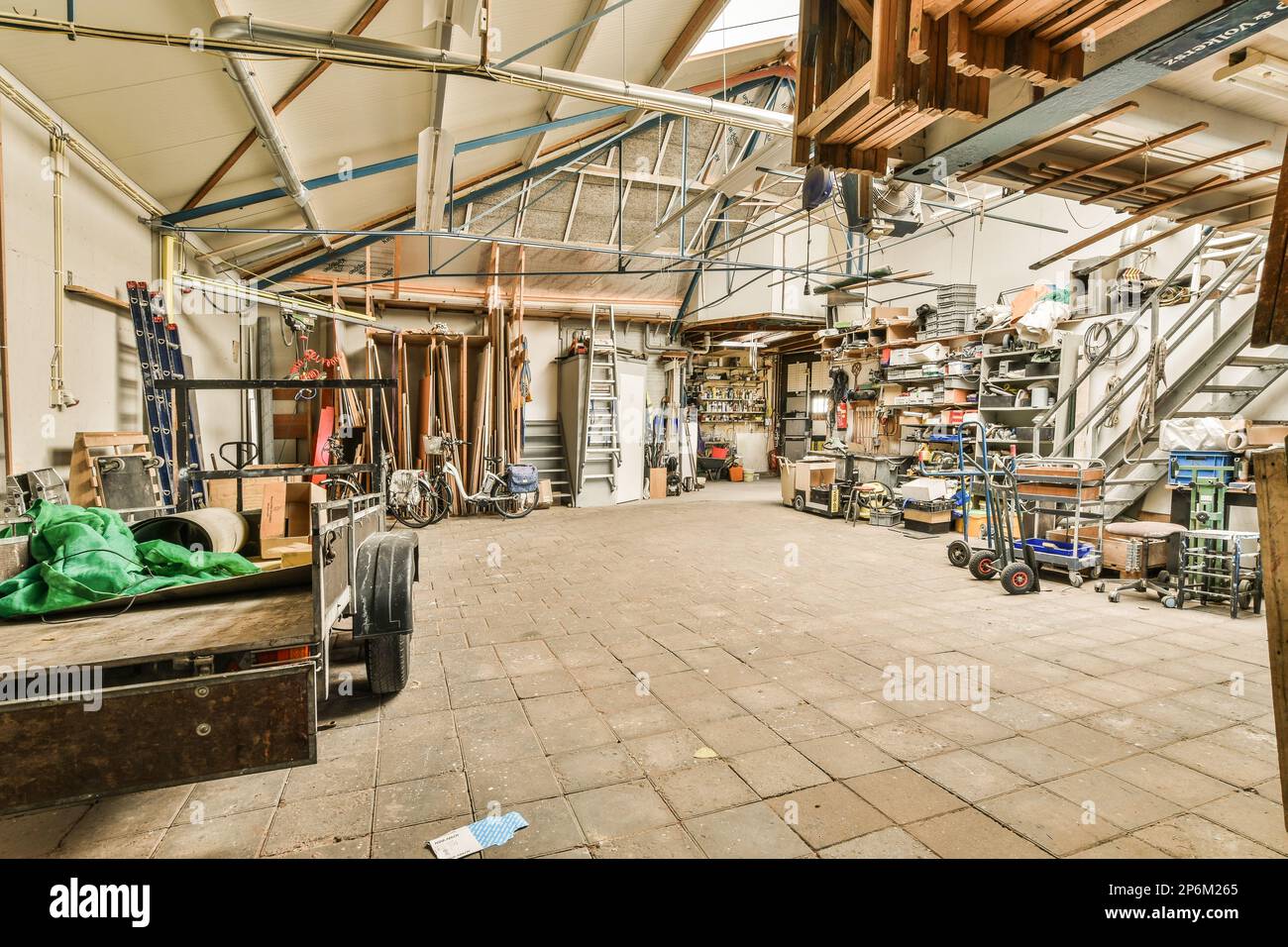 the inside of a building that is being used as a workshop for ...