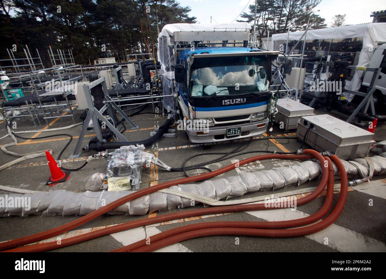 A unit of the emergency reactor water injection pump is seen at Tokyo ...