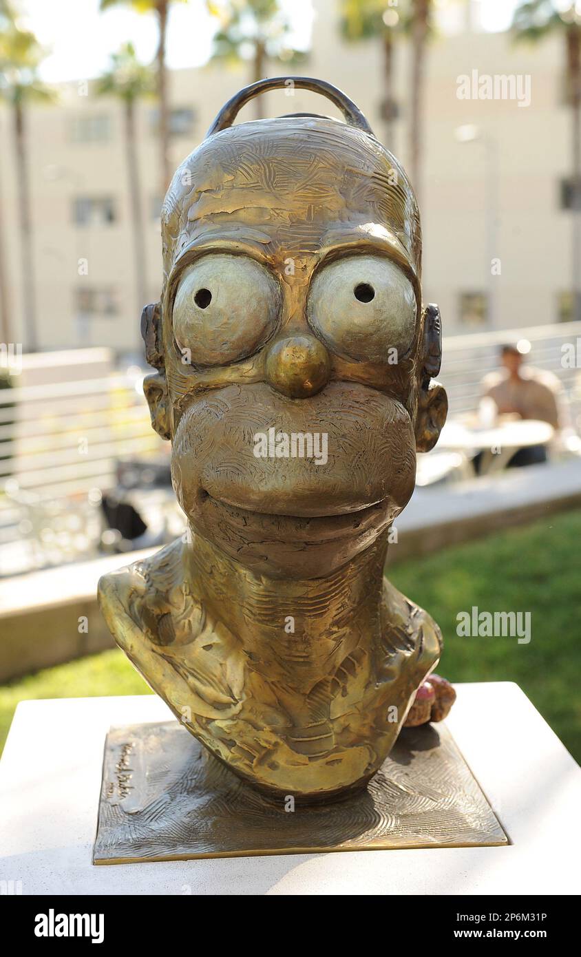 LOS ANGELES, CA - FEBRUARY 16: A bronze bust of Homer Simpson along ...