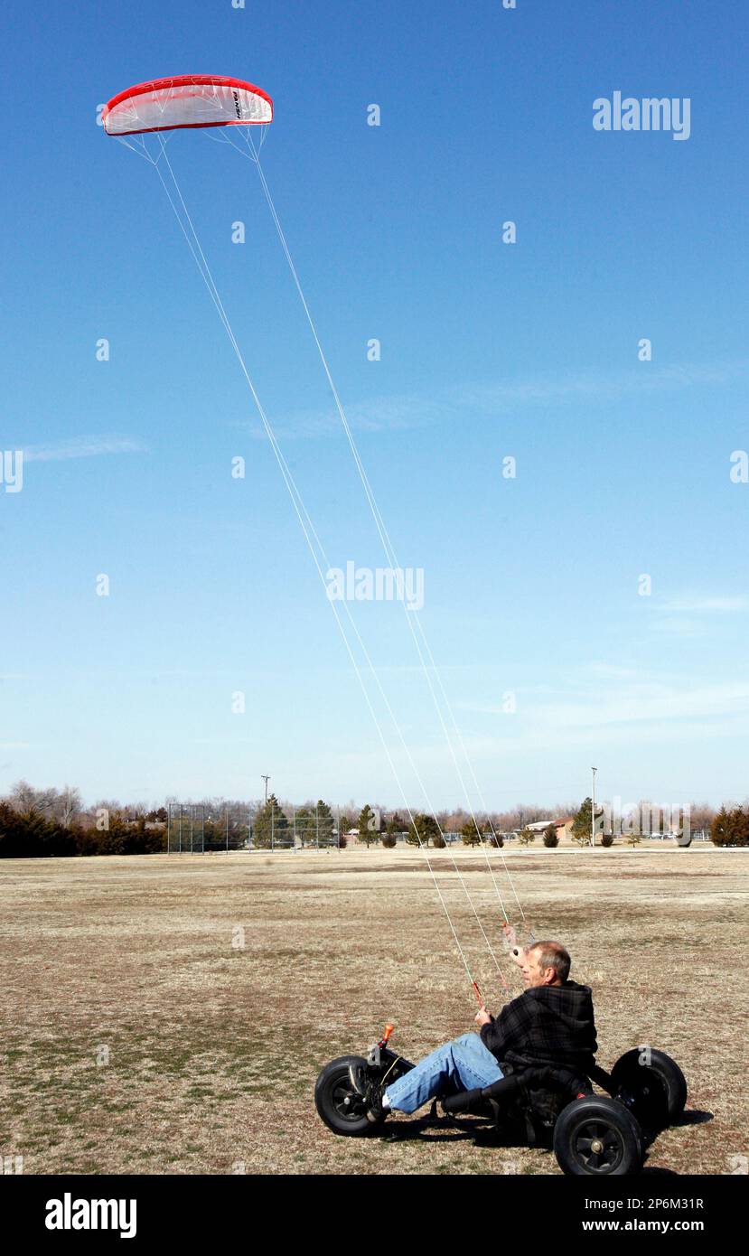 Wayne Schmidt rides a kite buggy on Sunday, Feb. 19, 2012, at the ...