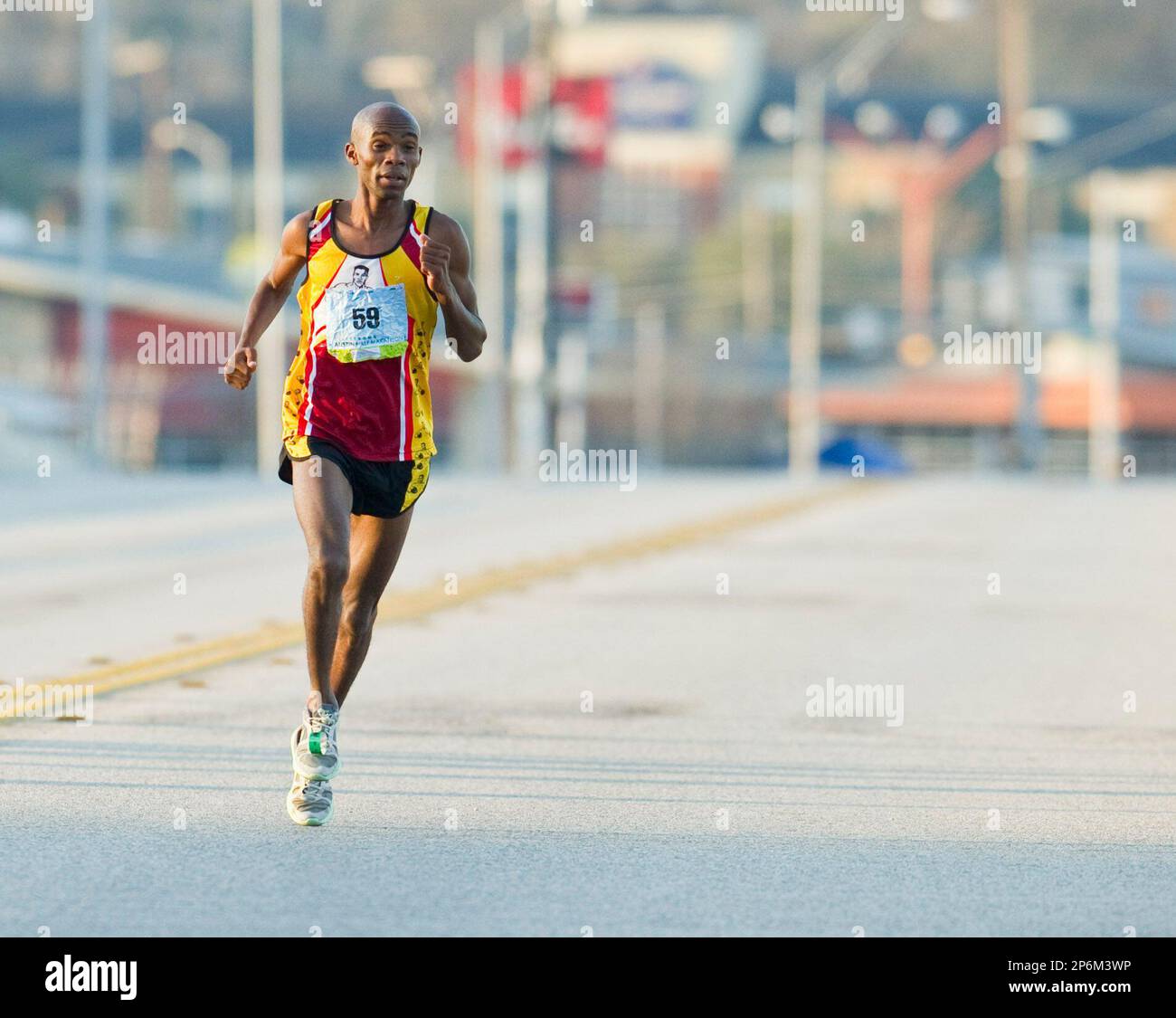 February 19, 2012:Siyabonga Nkonde (59) crossing the South First Street ...