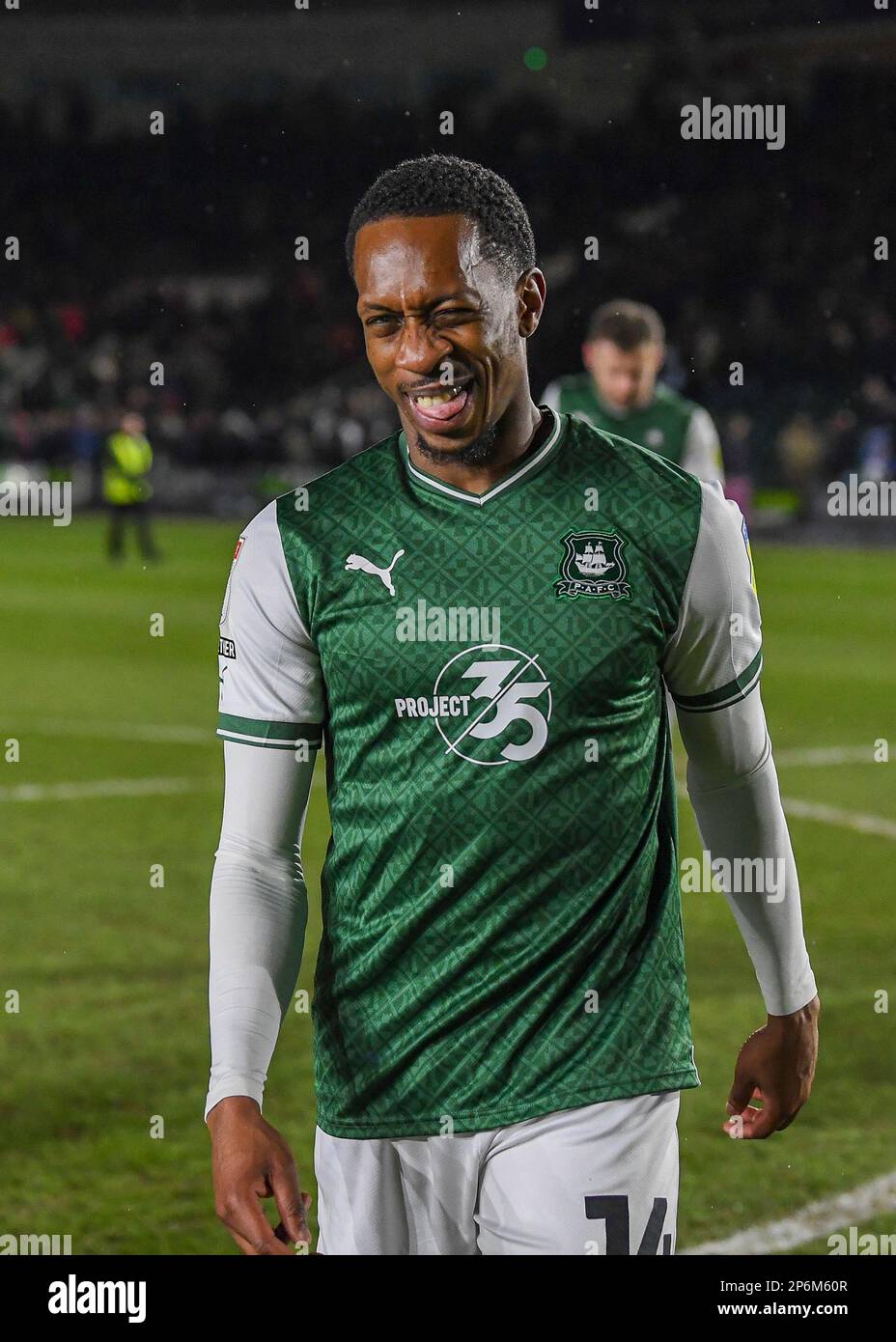 Mickel Miller #14 of Plymouth Argyle celebrates a win at full time ...