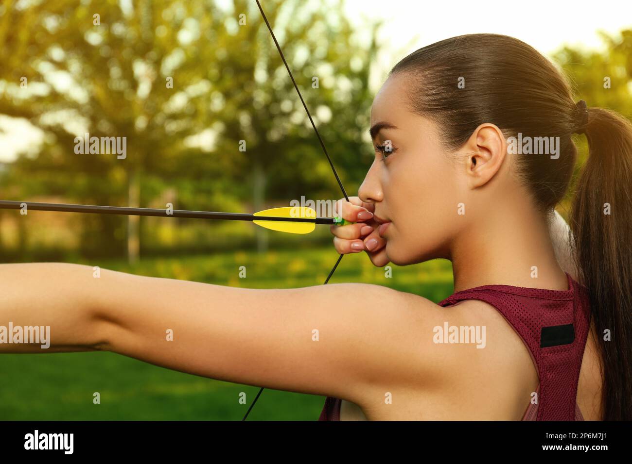 Woman practicing archery in hi-res stock photography and images - Alamy