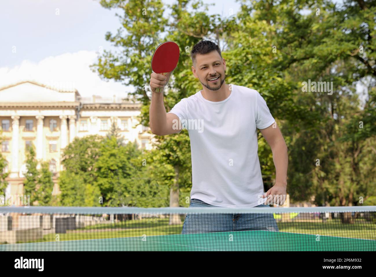 Man playing table tennis outdoors hi-res stock photography and images ...