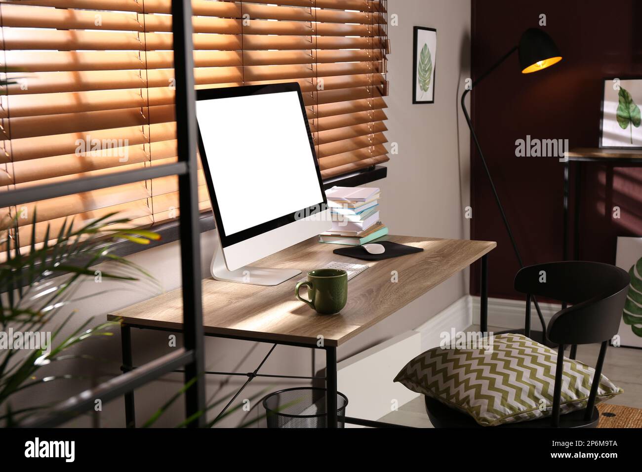 Comfortable workplace with modern computer and stylish furniture in ...