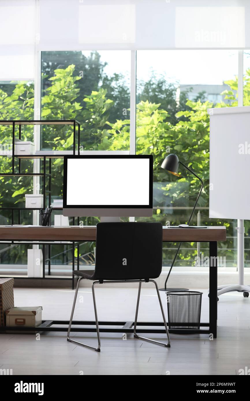 Comfortable workplace with modern computer and stylish furniture in ...