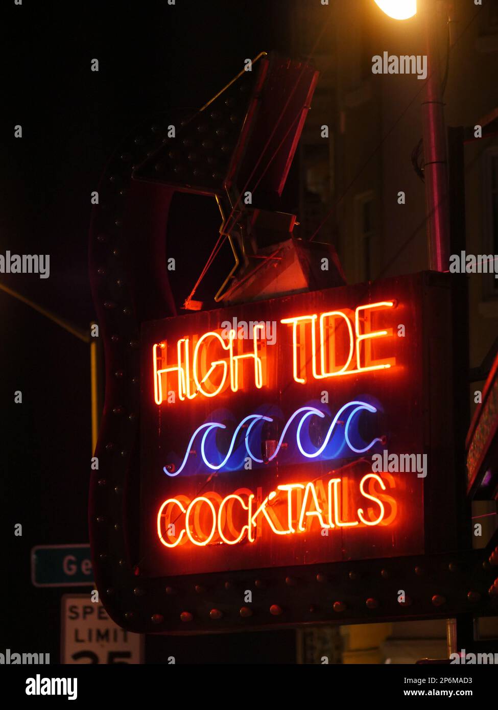 Illuminated signboard high tide cocktails Stock Photo - Alamy
