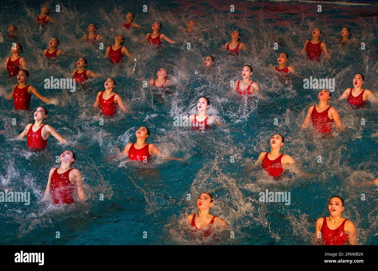 North Korean women perform in a mass synchronized swimming show in ...