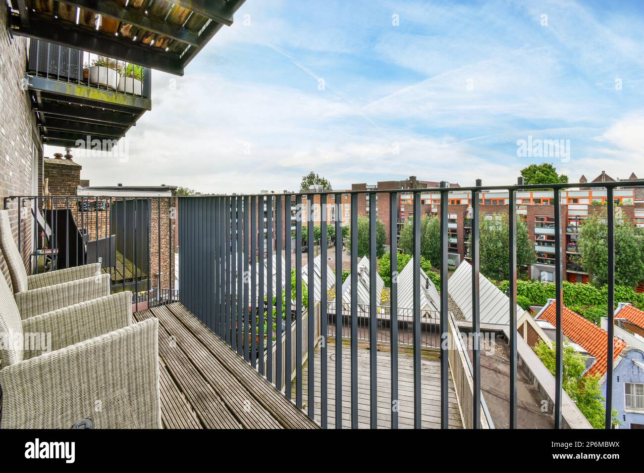 Amsterdam, Netherlands - 10 April, 2021: a balcony with wooden benches ...