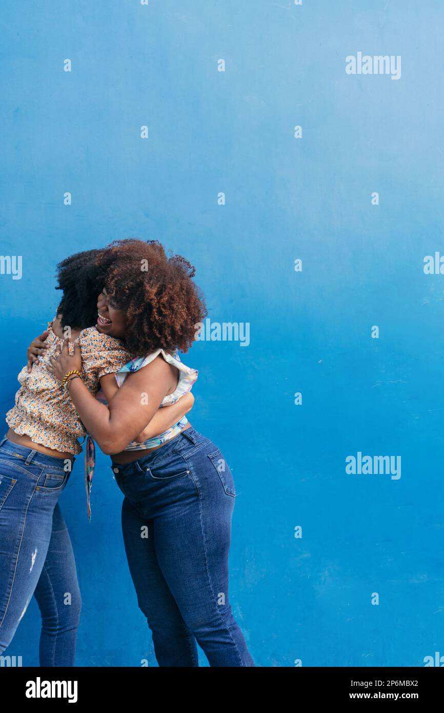 Women embracing hi-res stock photography and images - Alamy