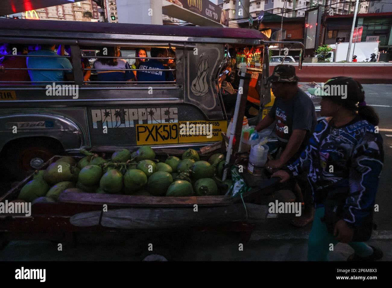 Manila, Manila, The Philippines. 8th Mar, 2023. A coconut hawker ...