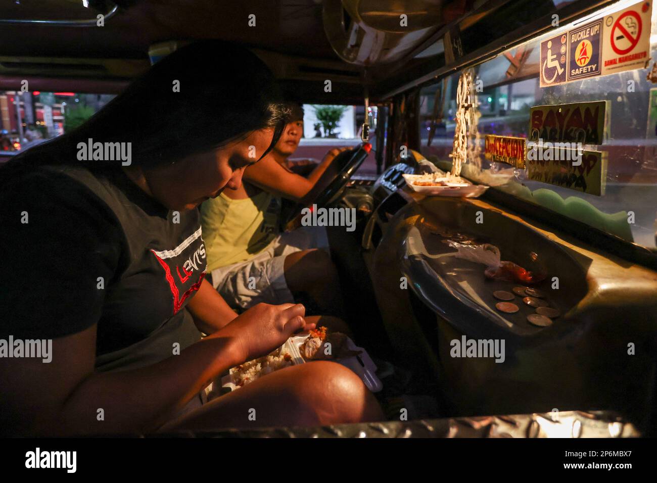 Manila, Manila, The Philippines. 8th Mar, 2023. A passenger enjoys her ...
