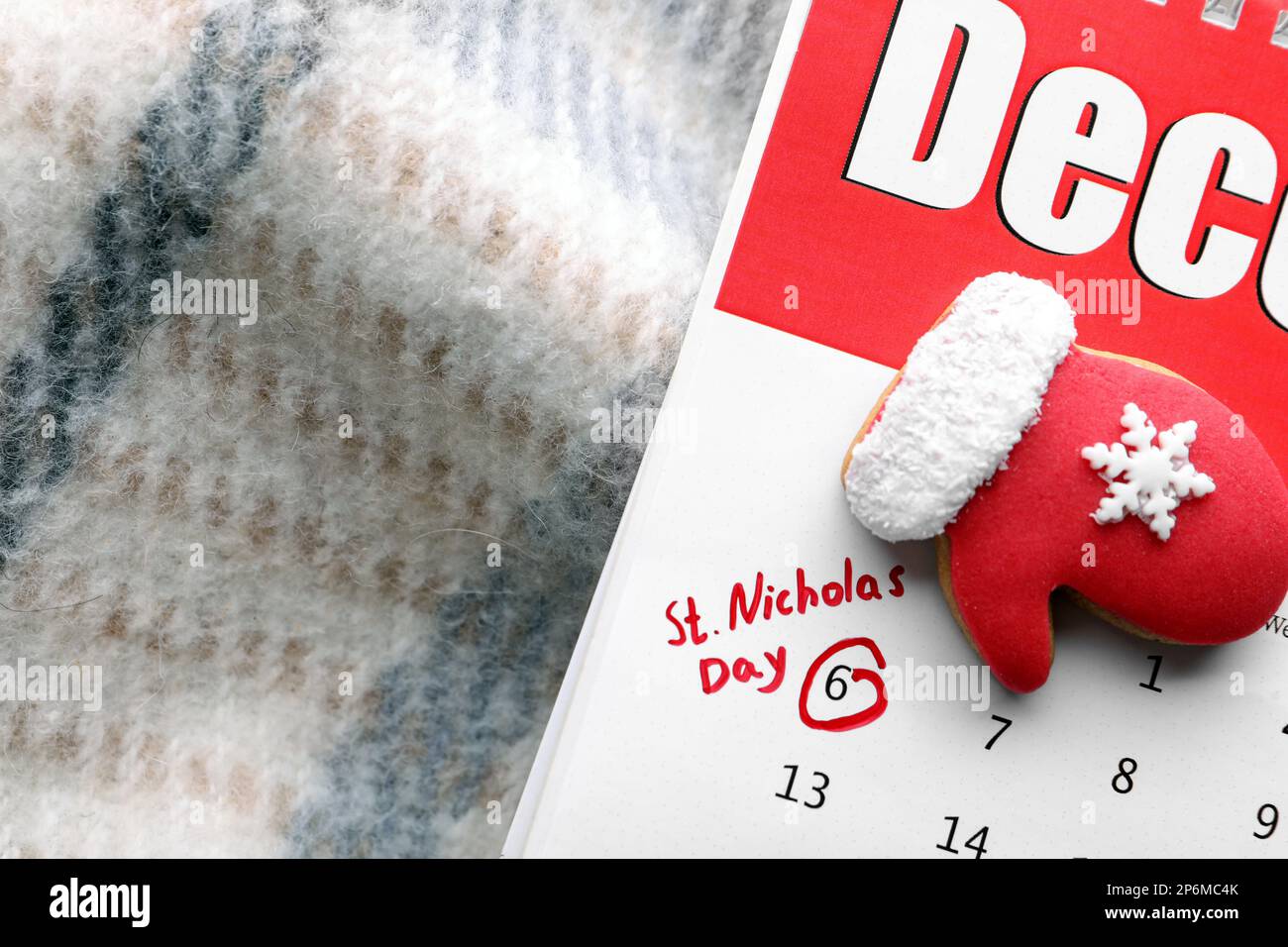 Saint Nicholas Day. Calendar with marked date December 06 and glove ...