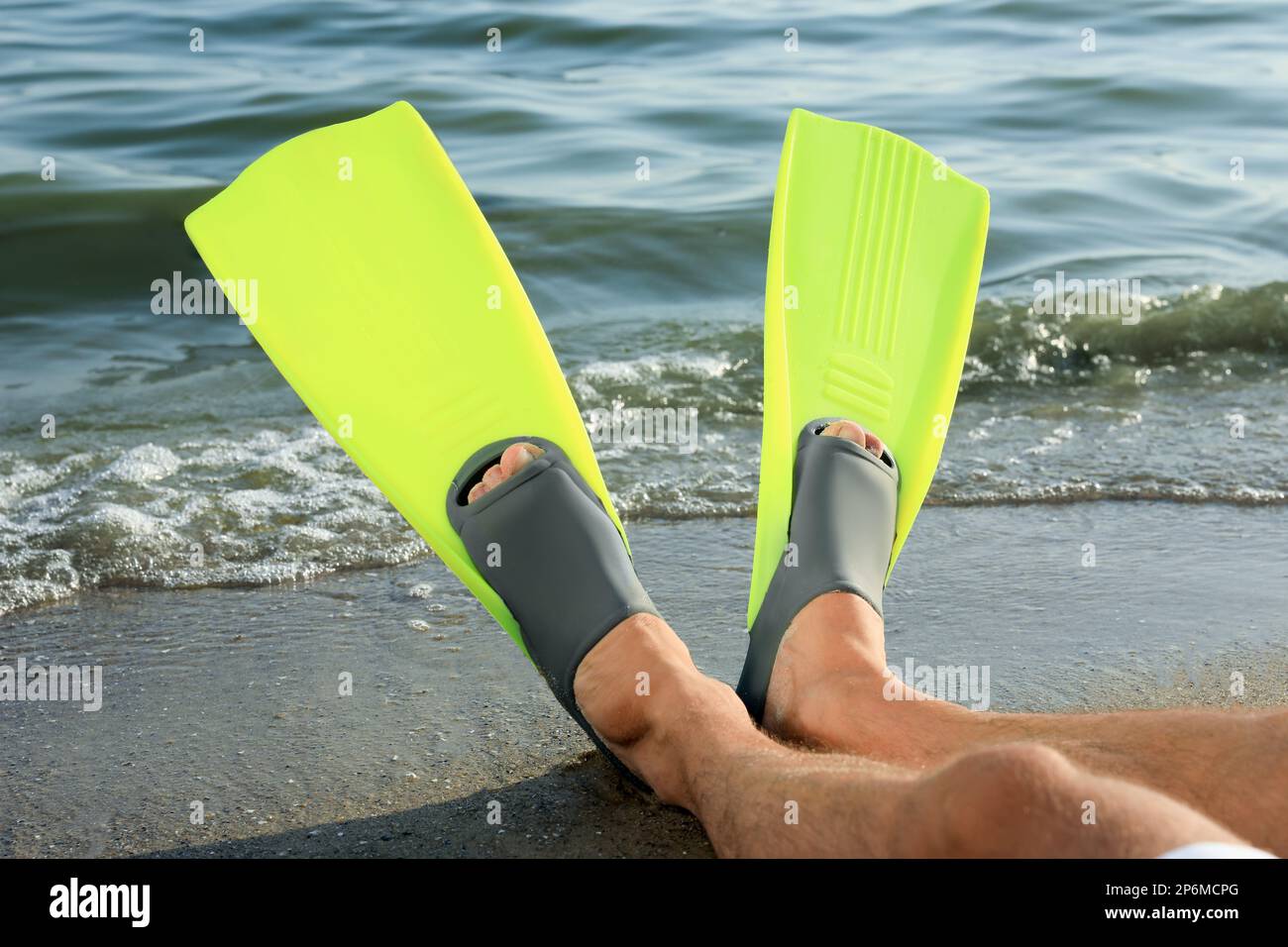 Man wearing swimming flippers hi-res stock photography and images - Alamy