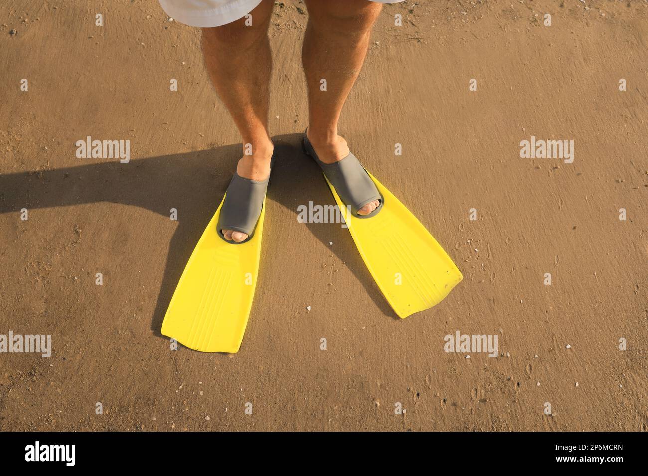 Man wearing swimming flippers hi-res stock photography and images - Alamy