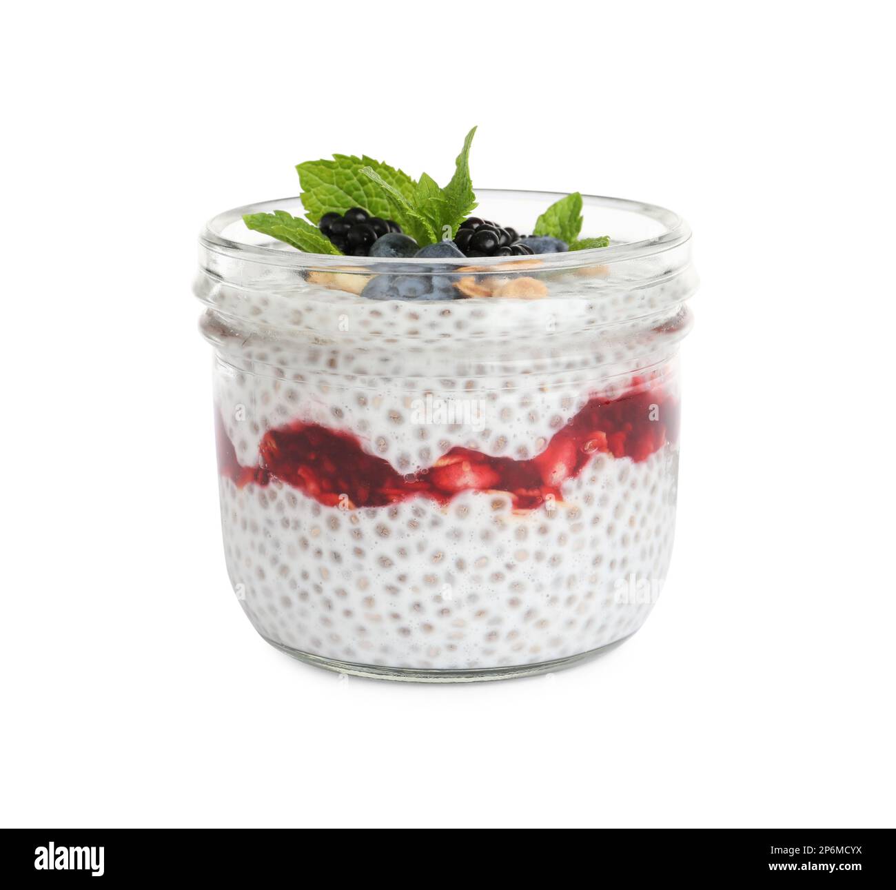Delicious chia pudding with berries and granola on white background ...
