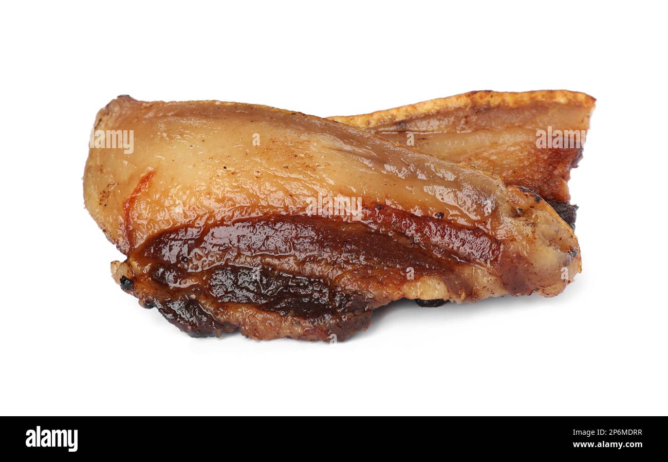 Tasty fried cracklings on white background. Cooked pork lard Stock ...