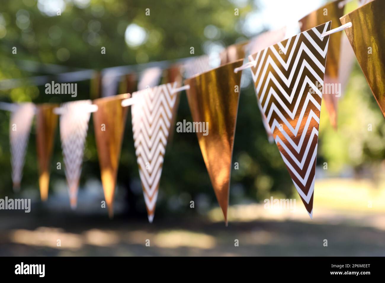 Golden flag party bunting hi-res stock photography and images - Alamy