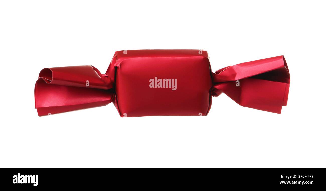 Delicious candy in red wrapper isolated on white Stock Photo - Alamy