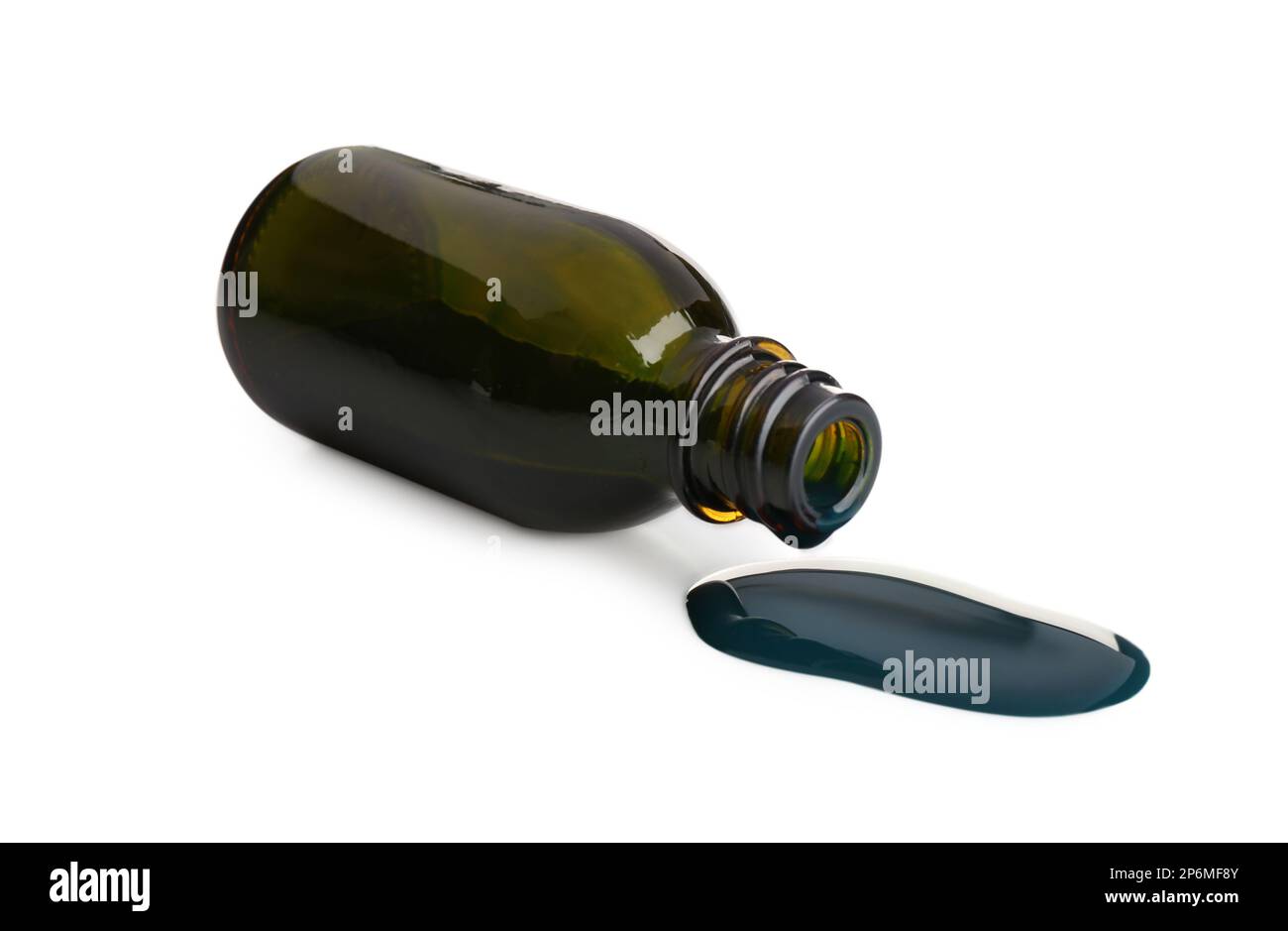 Overturned bottle and spilled brilliant green on white background Stock ...