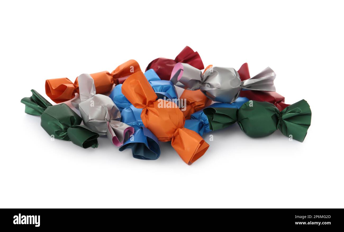 Many candies in colorful wrappers on white background Stock Photo - Alamy
