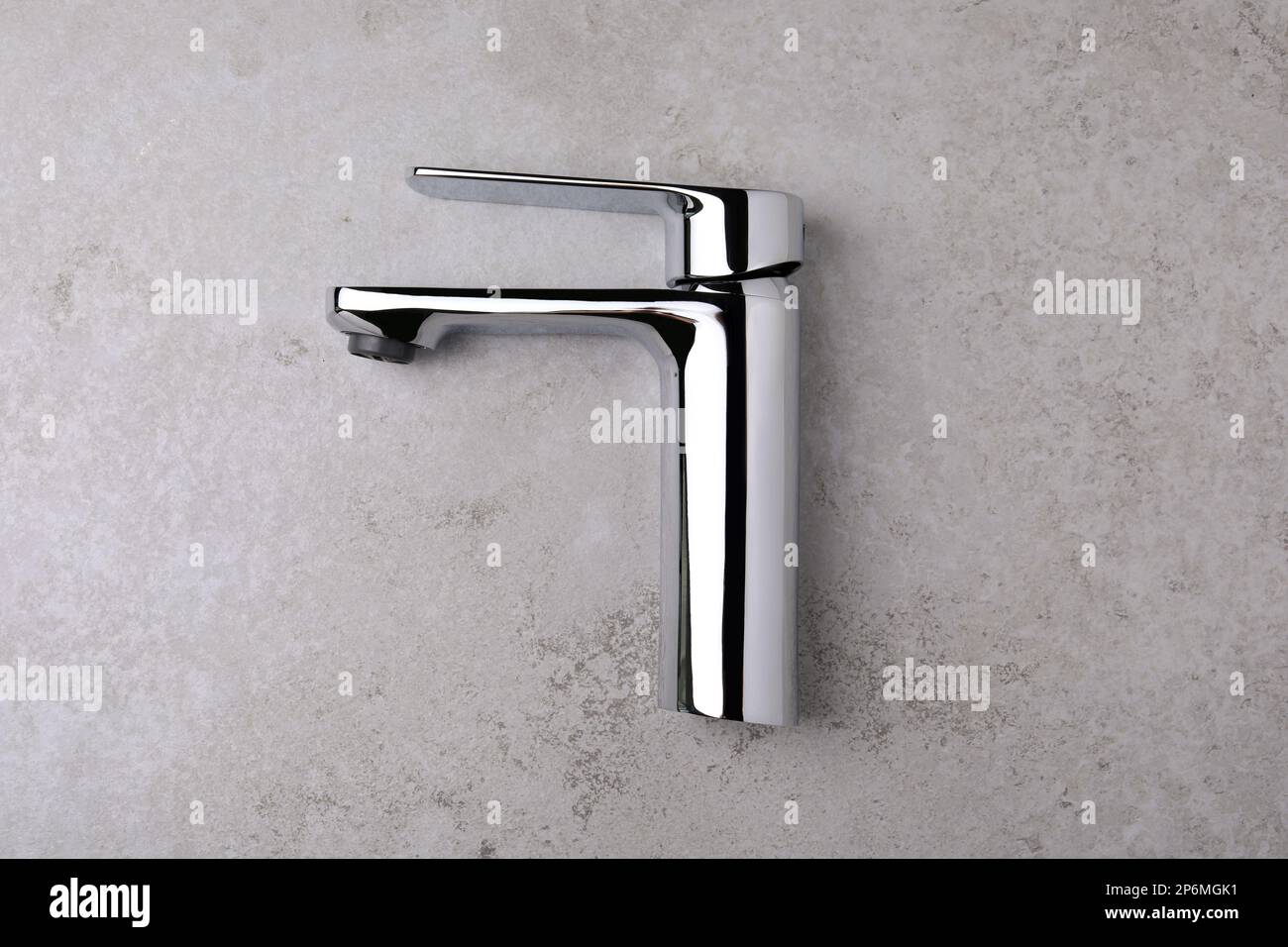 Single handle water tap on grey table, top view Stock Photo - Alamy