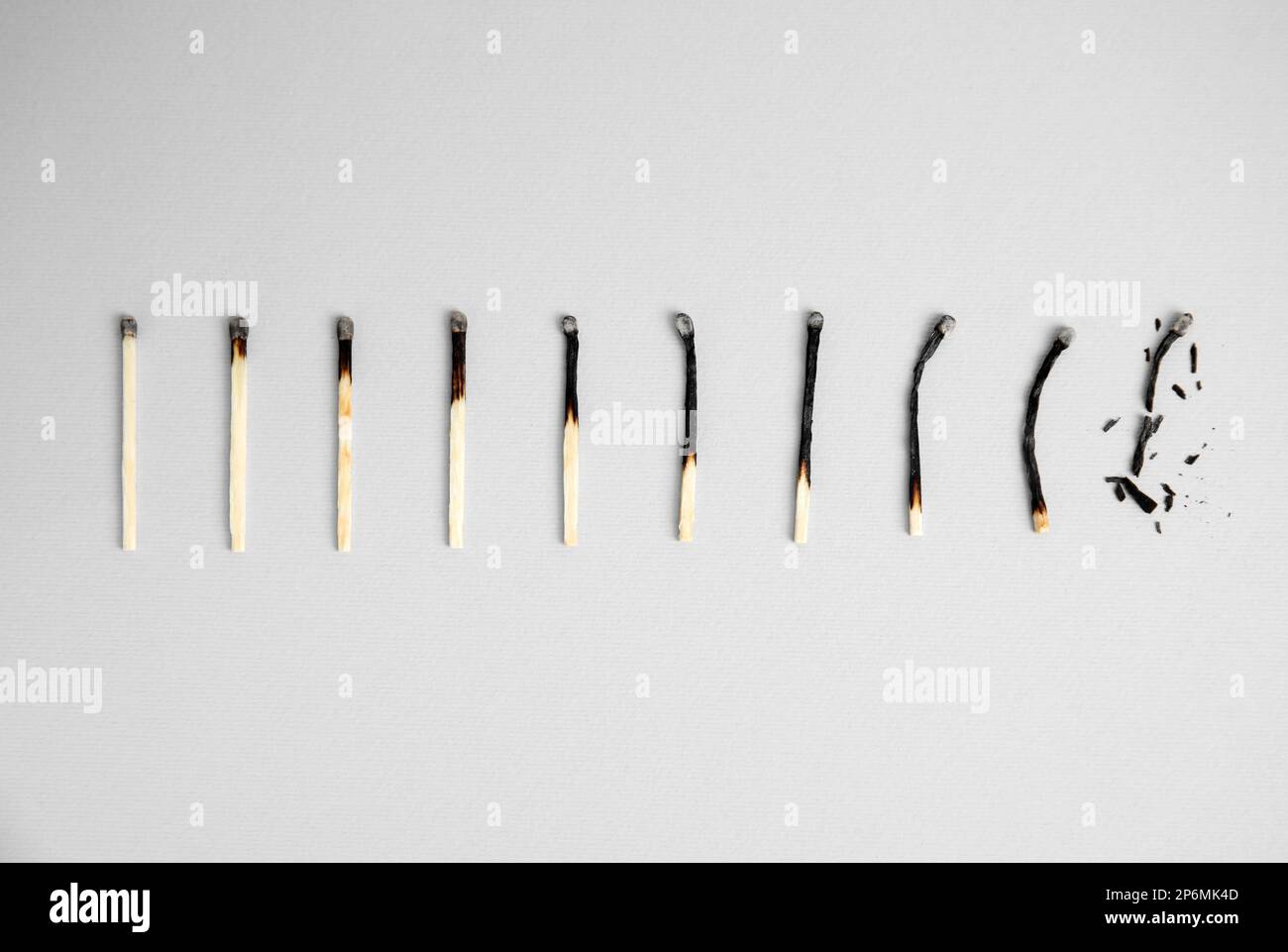 Different stages of burnt matches on light background, flat lay Stock ...