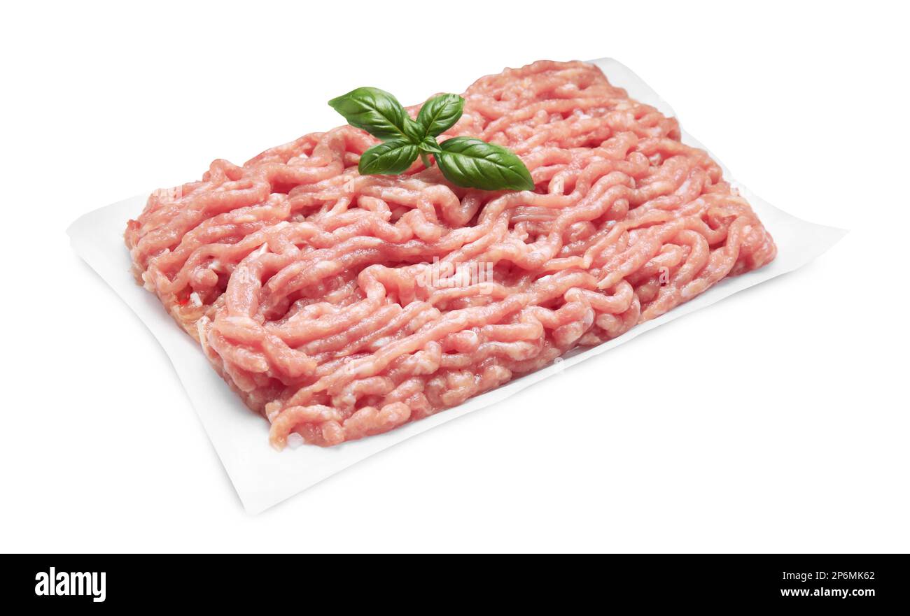 Raw chicken minced meat with basil on white background Stock Photo - Alamy