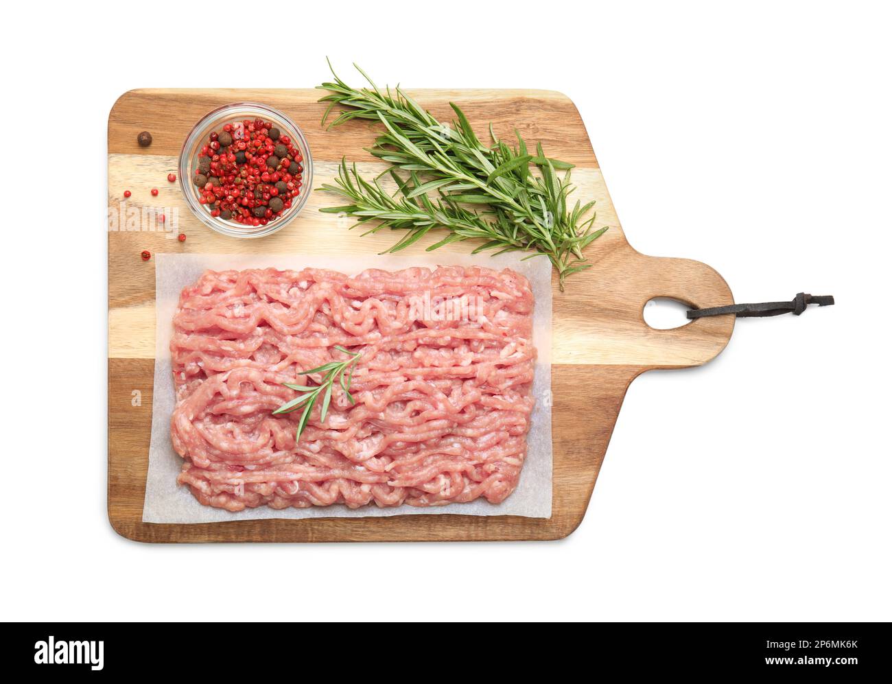 Raw chicken minced meat with spices and rosemary on white background ...